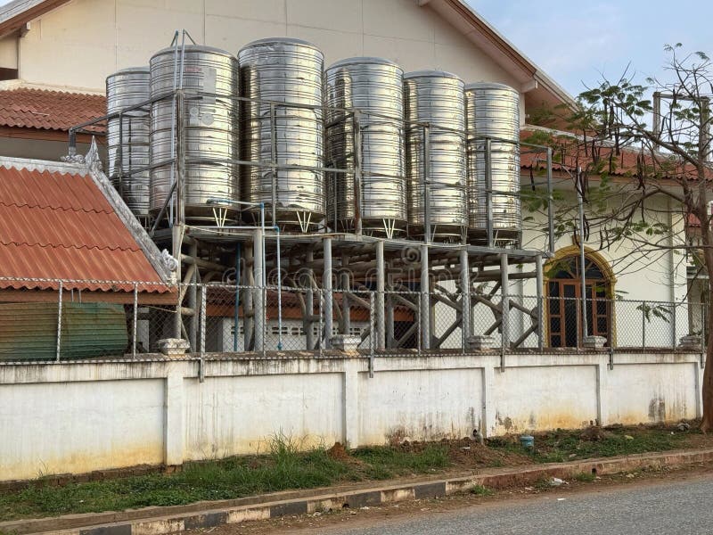 Stainless Steel Water Tanks Against Sky. Stock Image - Image of steel ...
