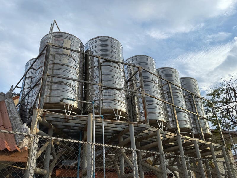 Stainless Steel Water Tanks Against Sky. Stock Photo - Image of ...