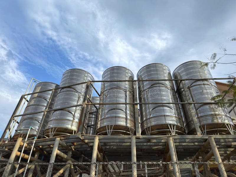 Stainless Steel Water Tanks Against Sky. Stock Image - Image of boiler ...