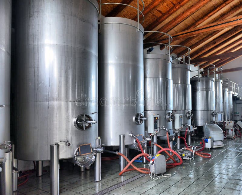 Wine fermentation vats stock image. Image of machinery - 3550021