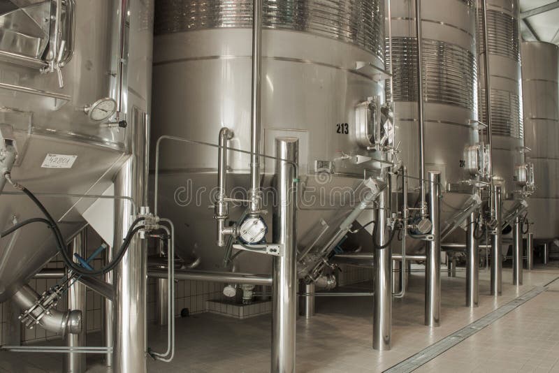 Stainless Steel Wine Vats in a Row Inside the Winery Stock Photo ...