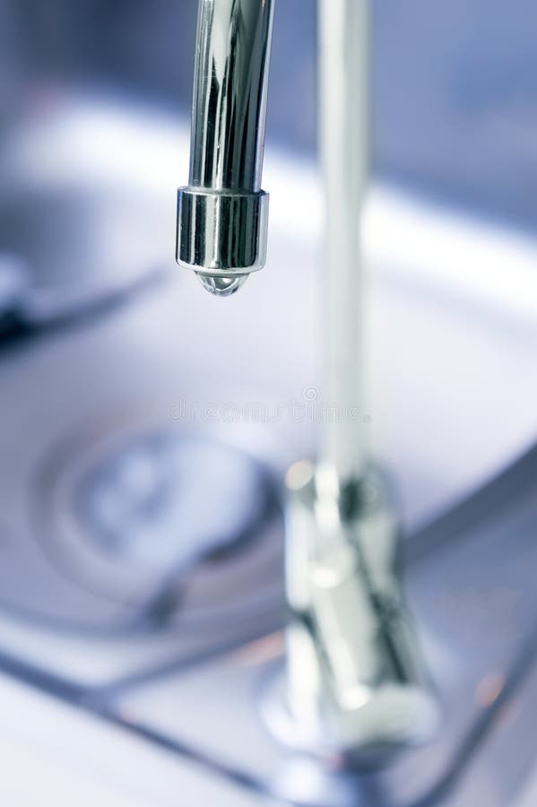 Stainless Tap with Water Drop in Modern Kitchen. Stock Image - Image of ...