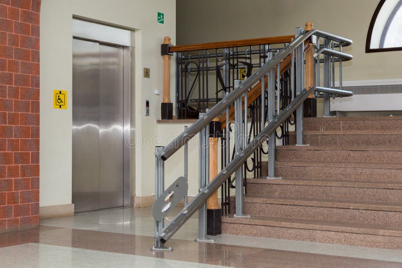 Stair Lift for the Disabled. Stairs of Public Building Stock Photo ...