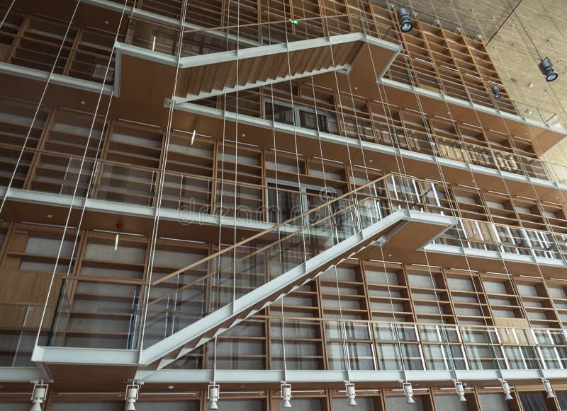 Staircase Along the Wall with Racks Stock Image - Image of business ...