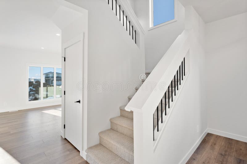 Staircase Leading To a Second Floor with a View of the Outside Stock ...