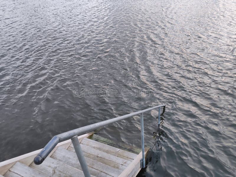 A Staircase Leads Down To the Water Stock Image - Image of mound ...