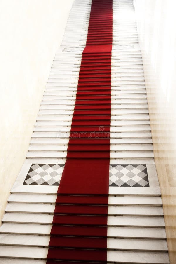 Staircase with Red Carpet, Illuminated by Light Stock Photo - Image of ...