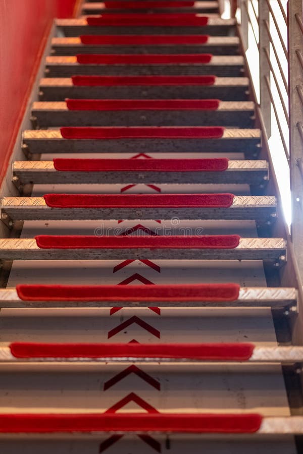 A staircase with red steps stock photo. Image of welcome - 280012988