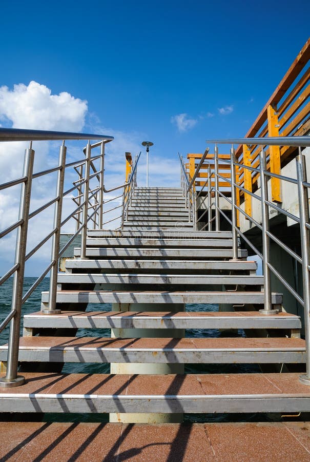 Staircase to pier stock photo. Image of steel, season - 32883918