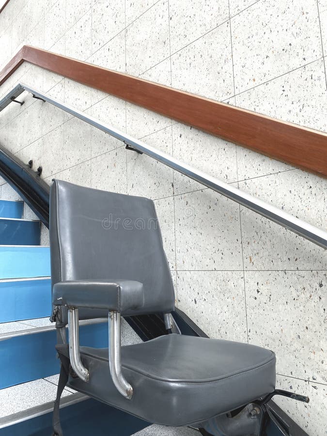 Stairlift Helping People with Reduced Mobility Navigate Building ...