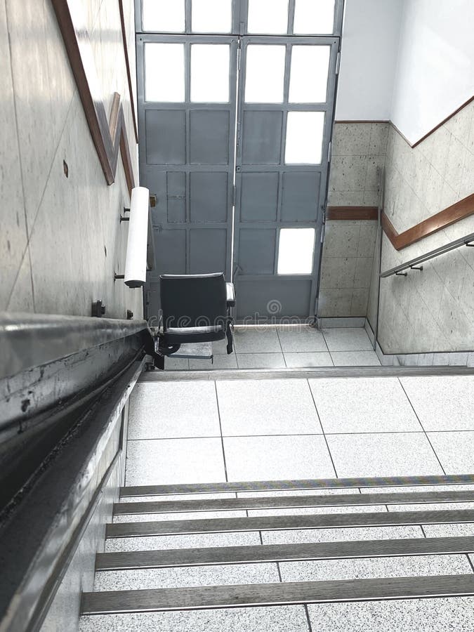 Stairlift Helping People with Reduced Mobility Navigate Building ...