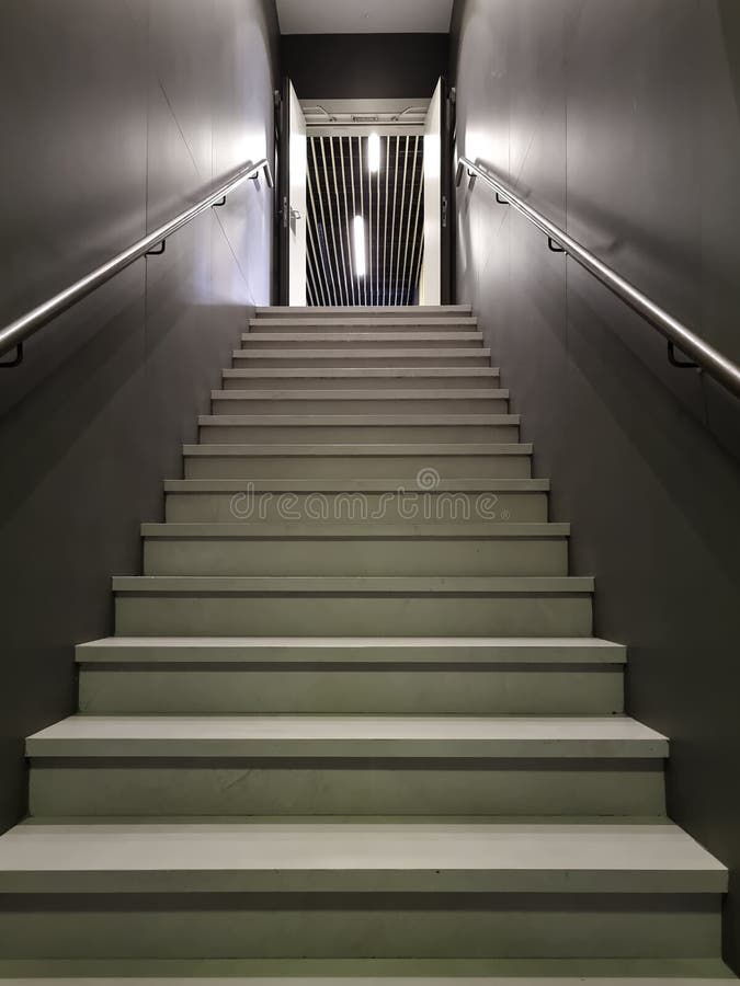 Stairs ascending to a door stock image. Image of design - 245167885