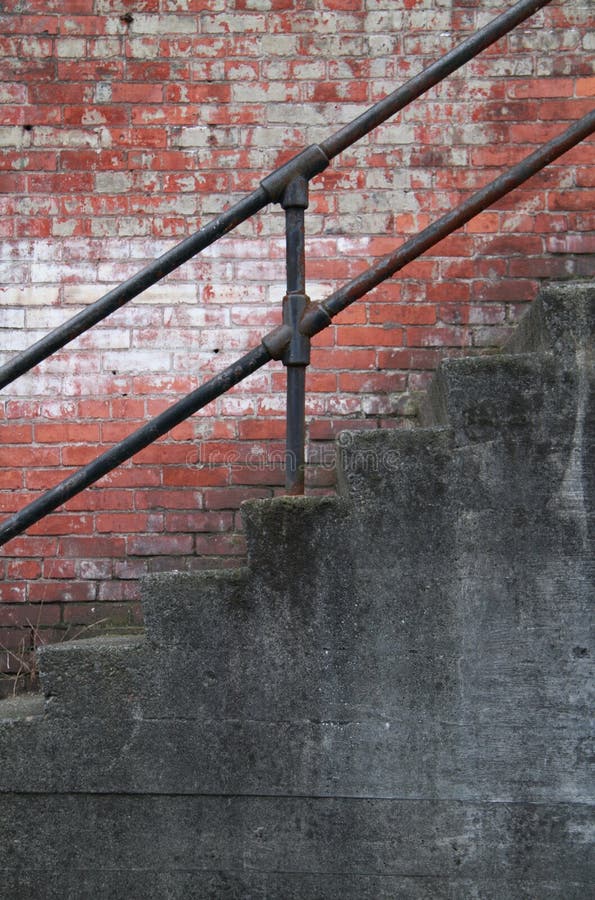 Stairs with Iron Railing and Old Brick Wall Stock Photo - Image of iron ...