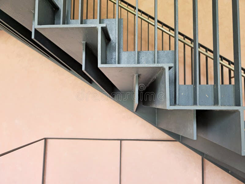 Stairs Made of Black Metal Over Pink Wall Stock Photo - Image of detail ...