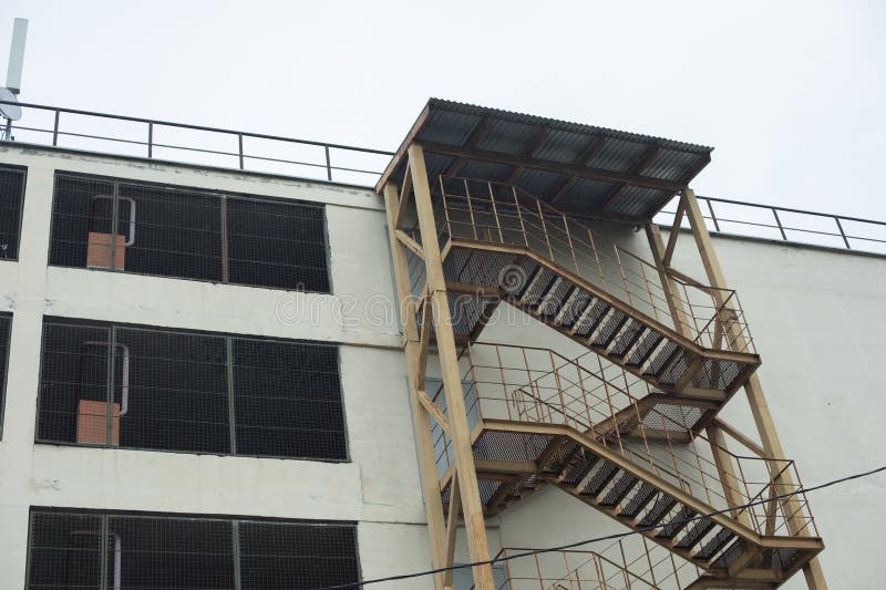 Stairs Outside Building. Fire Escape on Wall Stock Photo - Image of ...