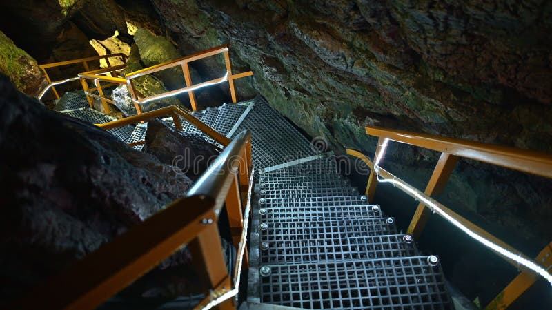 Stairs and Rails Inside of the Ialomita Cave in Th Stock Video - Video ...