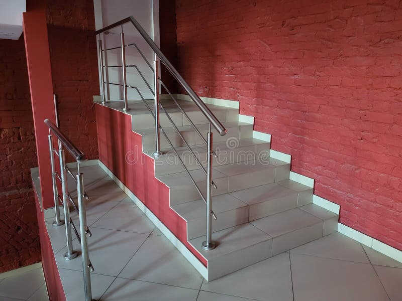 Stairs with Red Walls and Metal Handrails Stock Photo - Image of office ...