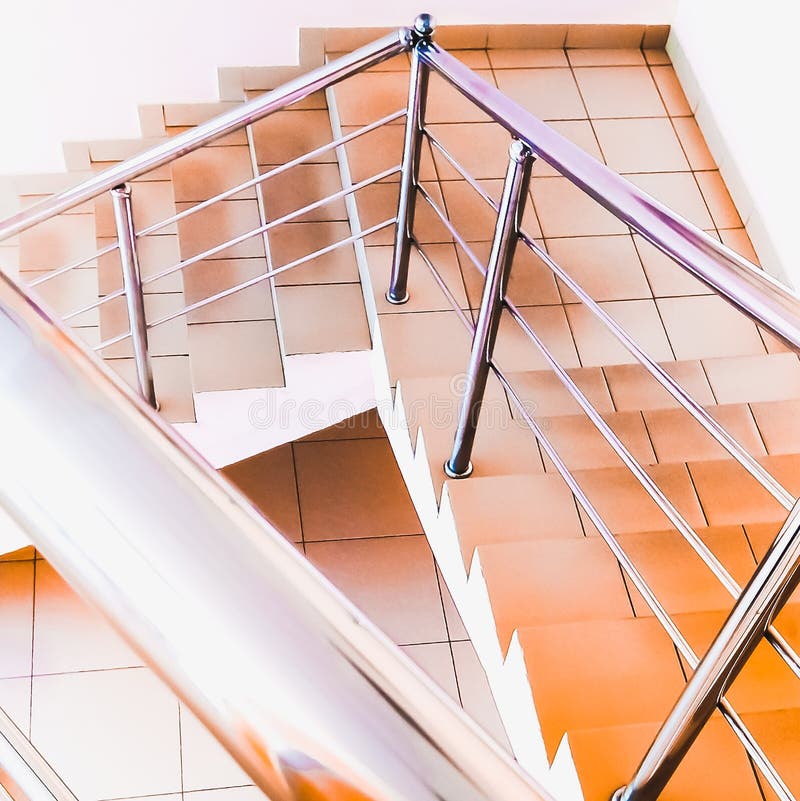 Stairs and shiny railings stock image. Image of handrail - 199771083