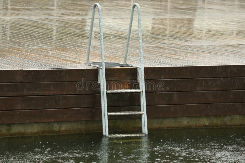 Stairs To the Pool Outside on a Rainy Day Stock Photo - Image of water ...