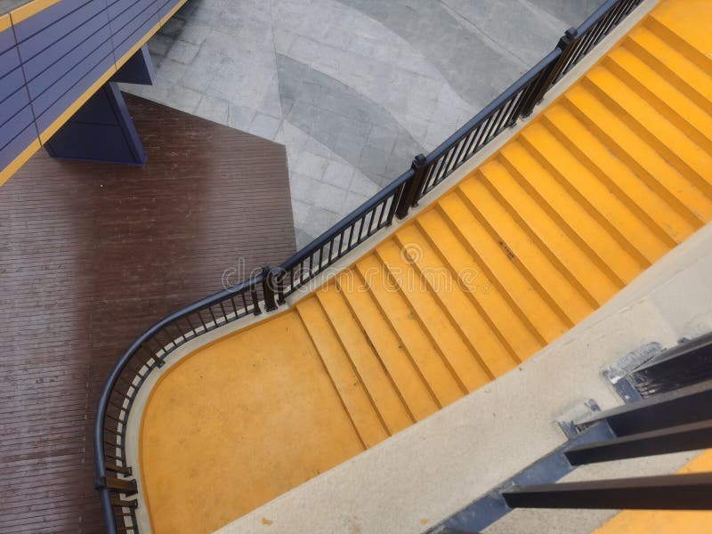 Stairs with yellow steps stock image. Image of metal - 311339981