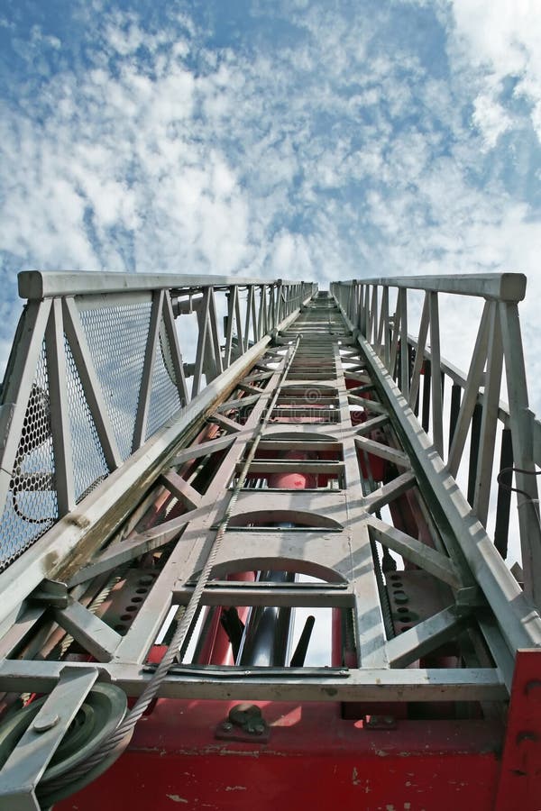 Fire ladder in the sky stock photo. Image of automobile - 4118898