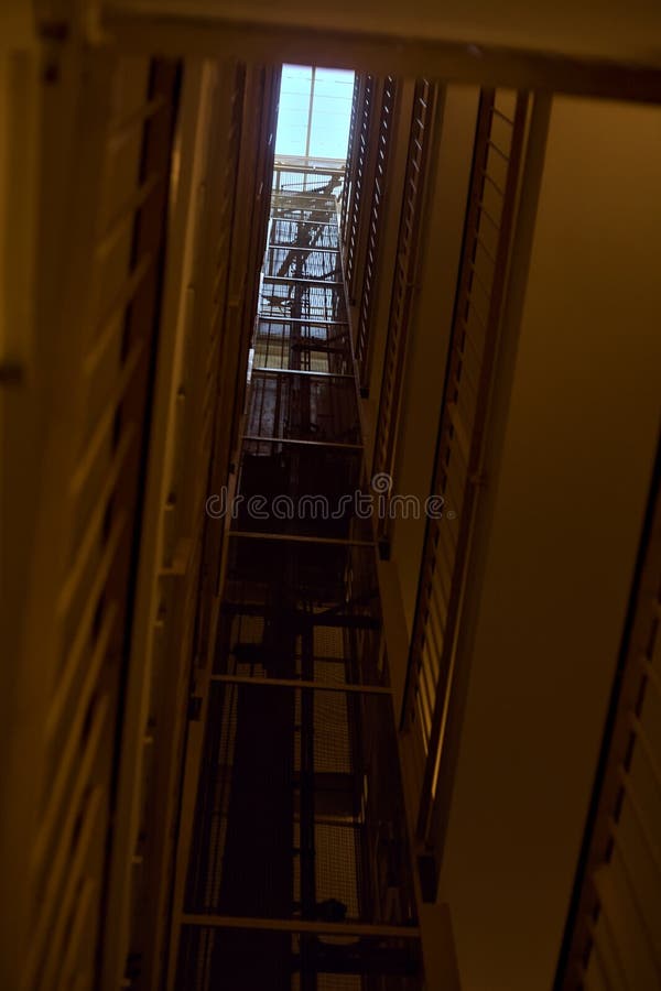 Stairwell and Elevator in a Residential Building with a Window on the ...