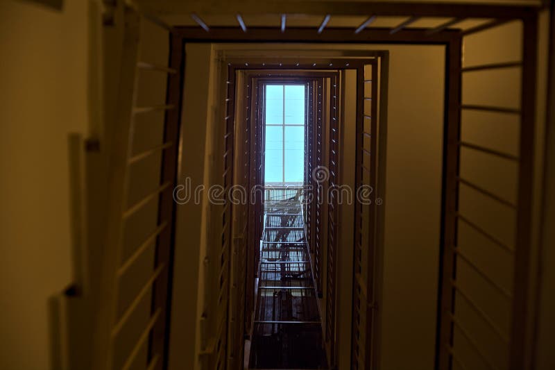 Stairwell and Elevator in a Residential Building with a Window on the ...