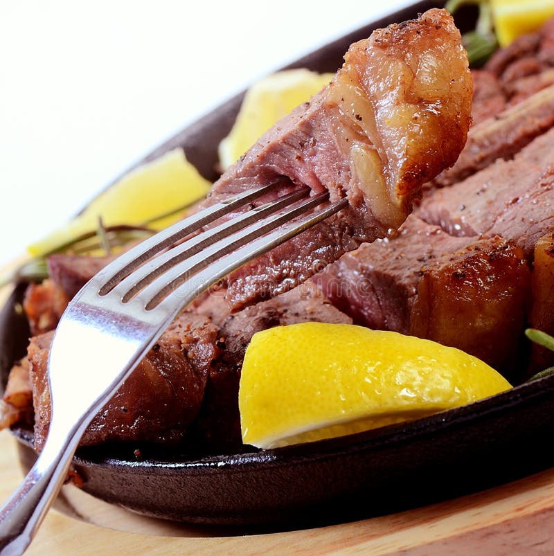 Stake from Mutton with a Lemon Stock Image - Image of close, dish: 42709207