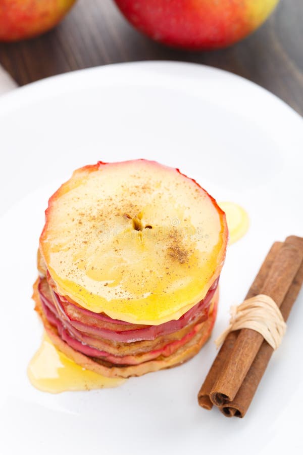 Stake of Sliced Baked Apple Stock Photo - Image of plate, white: 35013184