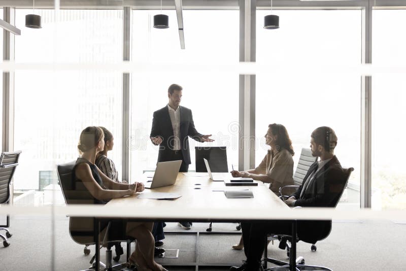 Stakeholders Sit at Conference Table Listening Speech of Businessman ...