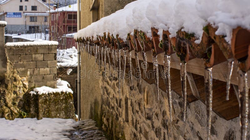 Stalactite on a roof. stock image. Image of winter, snow - 112497529