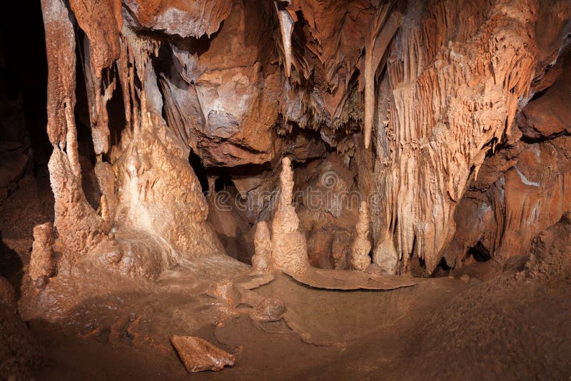 Stone columns in a cave stock photo. Image of column - 31295526