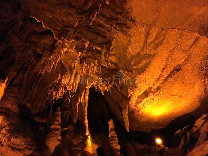 Stalactites and Stalagmites Glowing in Mammoth Cave Stock Image - Image ...