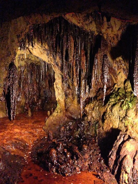 Stalagmites and Stalactites in a Cave Stock Photo - Image of cold, cave ...