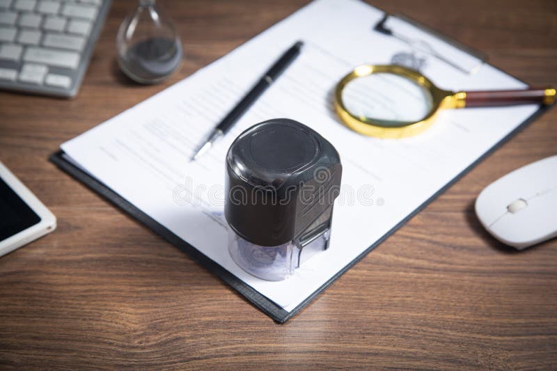 Stamp on Document on the Desk Stock Photo - Image of document ...