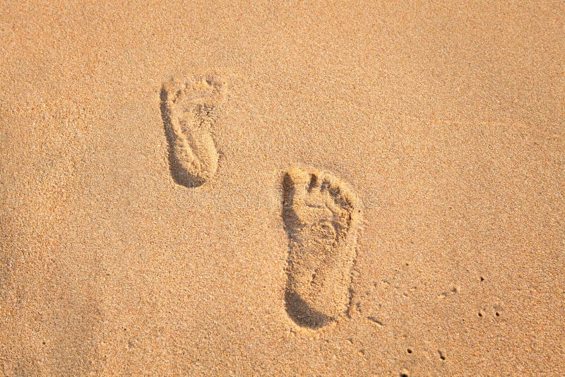 Stamp of Feet on Sand on the Beach with Sunshine Stock Image - Image of ...