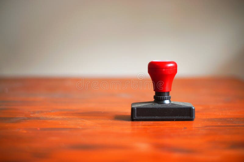 A stamp is on the table. stock photo. Image of papper - 285092746
