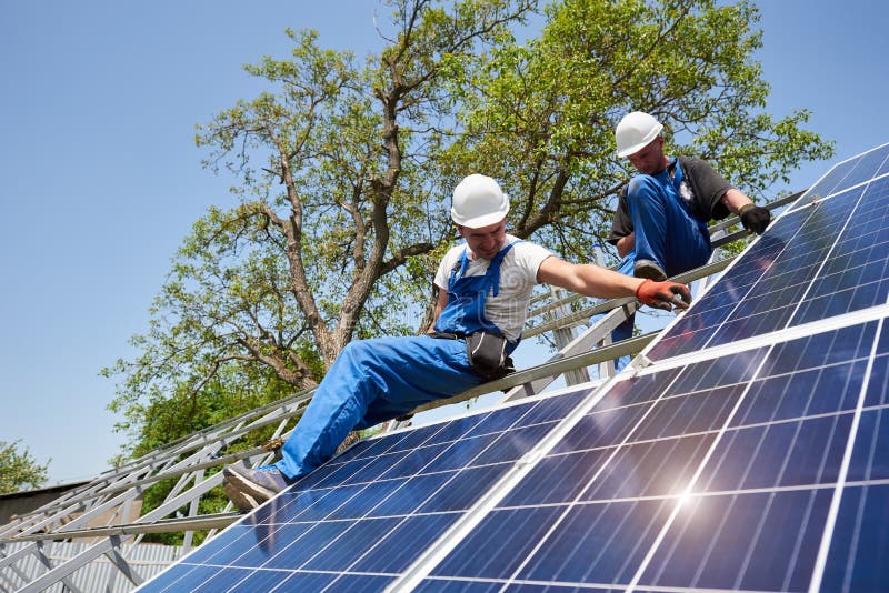 Installing Solar Photovoltaic Panel System on Roof of House Stock Image ...