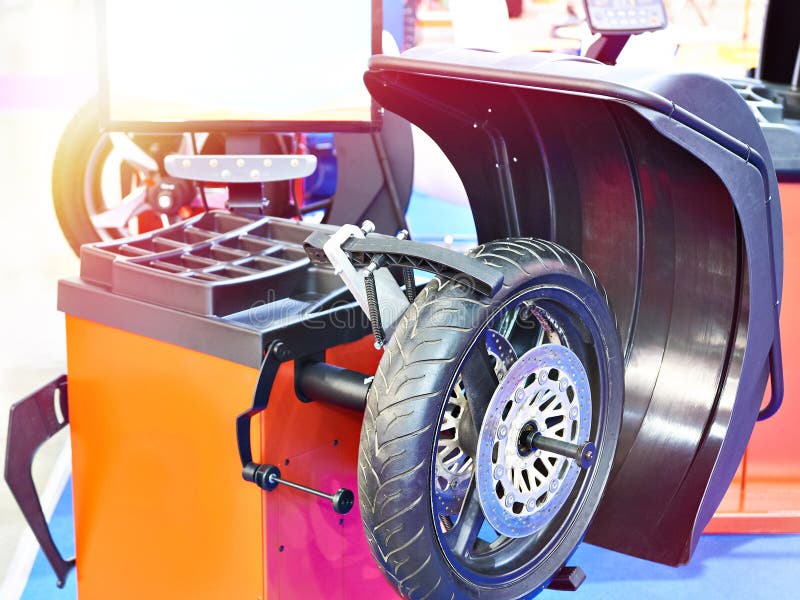 Stand for Balancing Wheels Isolated White Stock Photo - Image of tyre ...