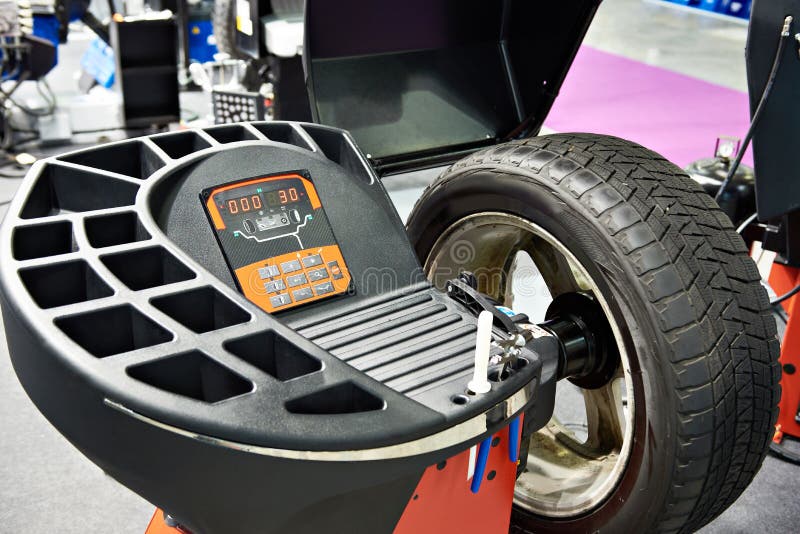 Stand for Balancing Wheels of Car Stock Photo - Image of balancing ...