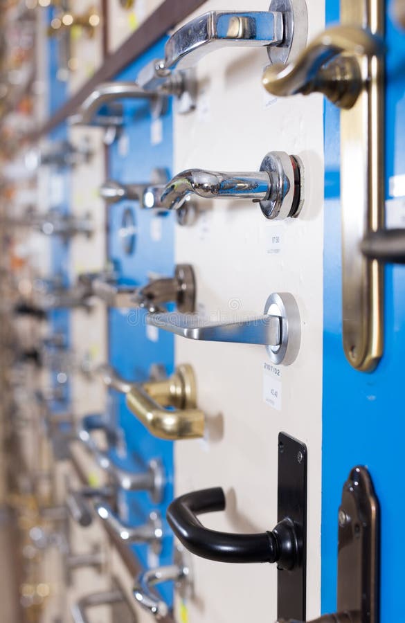 Stand with Door Handles in Store Stock Photo - Image of knobs, chrome ...
