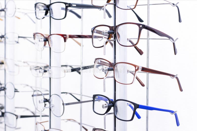Stand with Eyeglasses in the Store. the Choice of Spectacles for ...