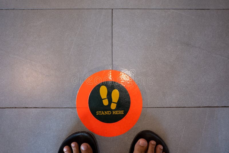 Stand Here Foot Sign or Symbol on the Floor Stock Photo - Image of ...