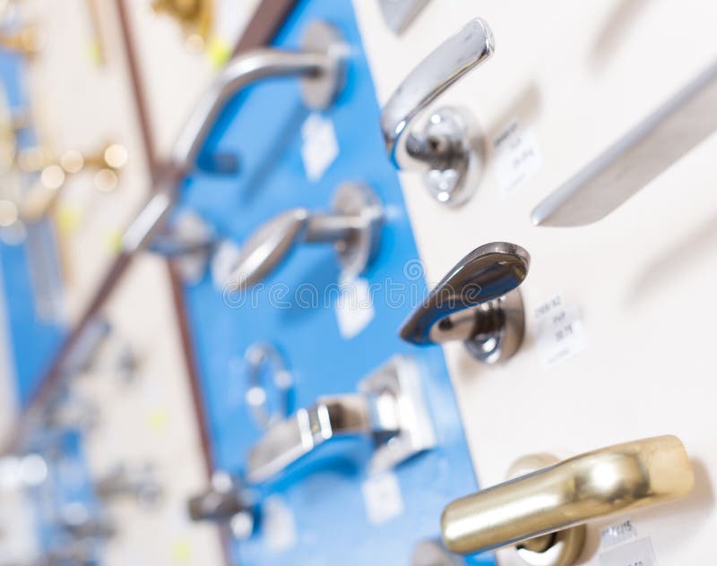 Stand with Door Handles in Store Stock Image - Image of metallic ...