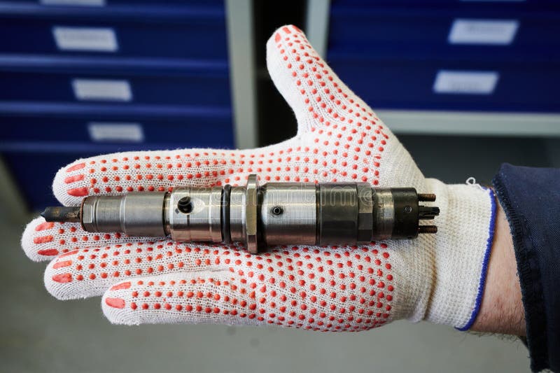 At the Stand, the Process of Checking the Operability and Wear, the ...