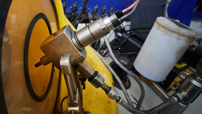 At the Stand, the Process of Checking the Operability and Wear, the ...