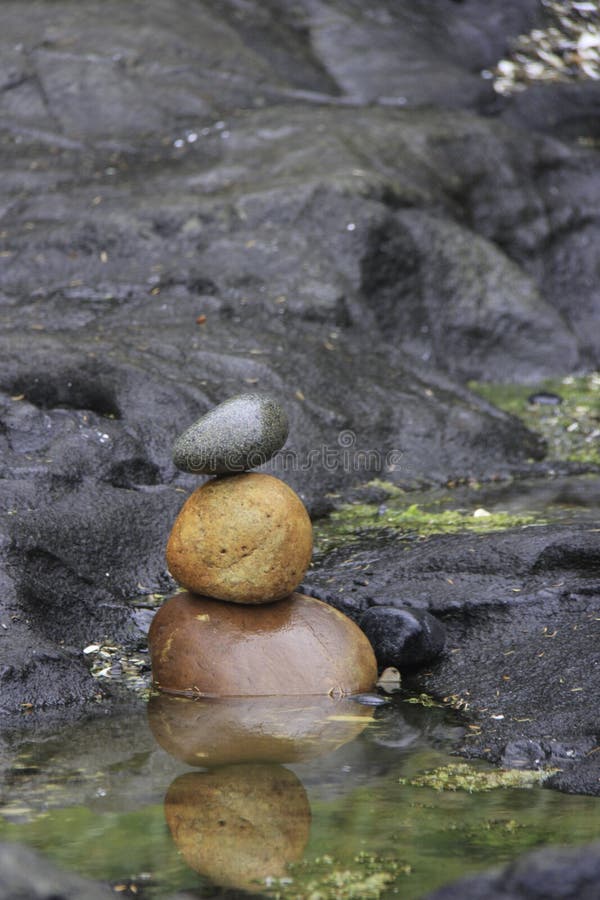 Stand of rocks stock photo. Image of black, rocks, reflection - 44931674