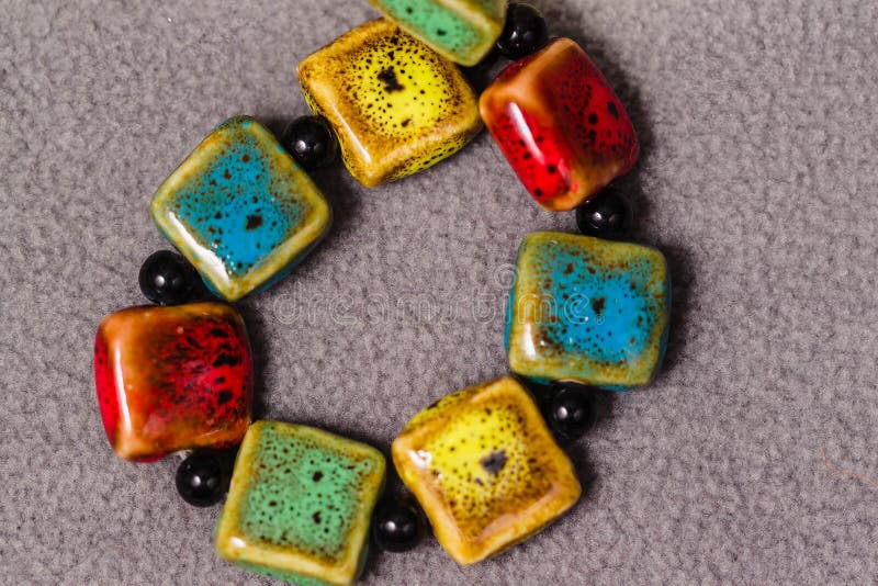 A Stand of Square Multi Colored Beads for the Creation of Jewelry Stock ...