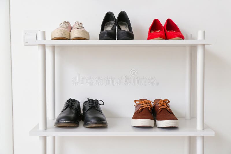 Stand with Stylish Shoes in Interior of Modern Hall Stock Photo - Image ...