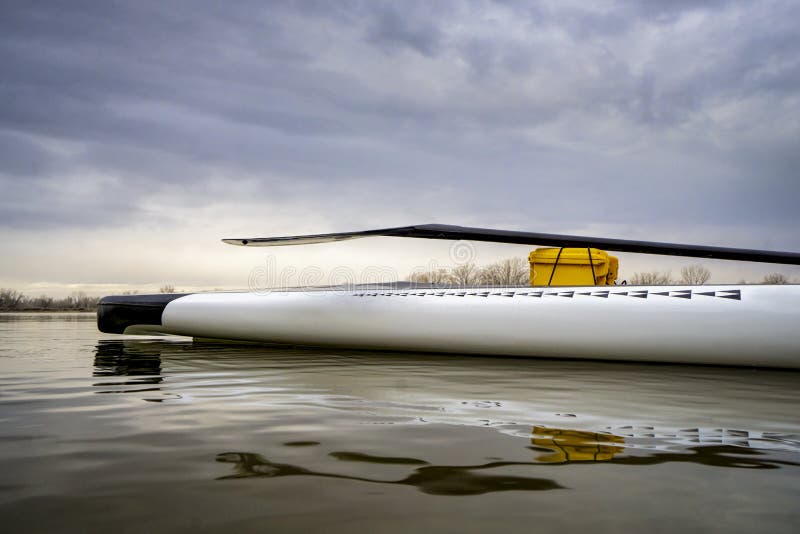 Stand Up Paddleboard and Waterproof Case Stock Photo - Image of paddle ...
